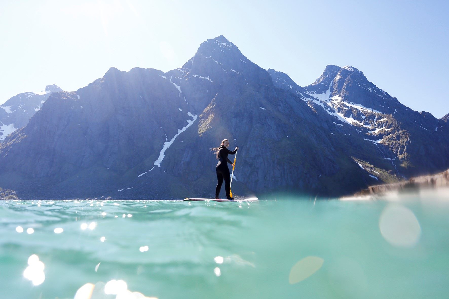 Stand-Up Paddle Tour - Unstad Arctic Surf - Visit Lofoten